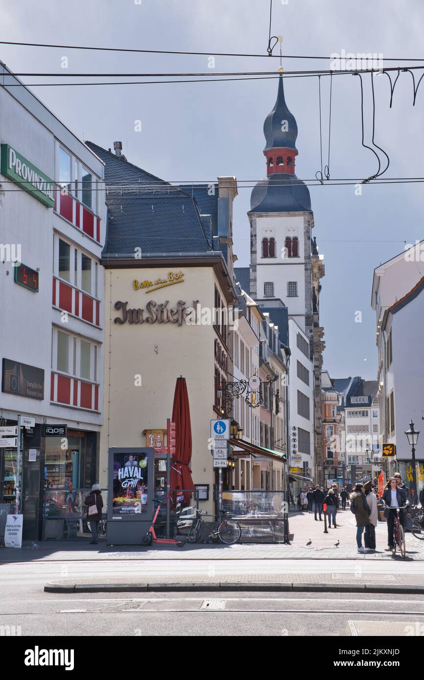 View of a shopping street in the center of Bonn, Germany and of the jesus church Stock Photo - Alamy