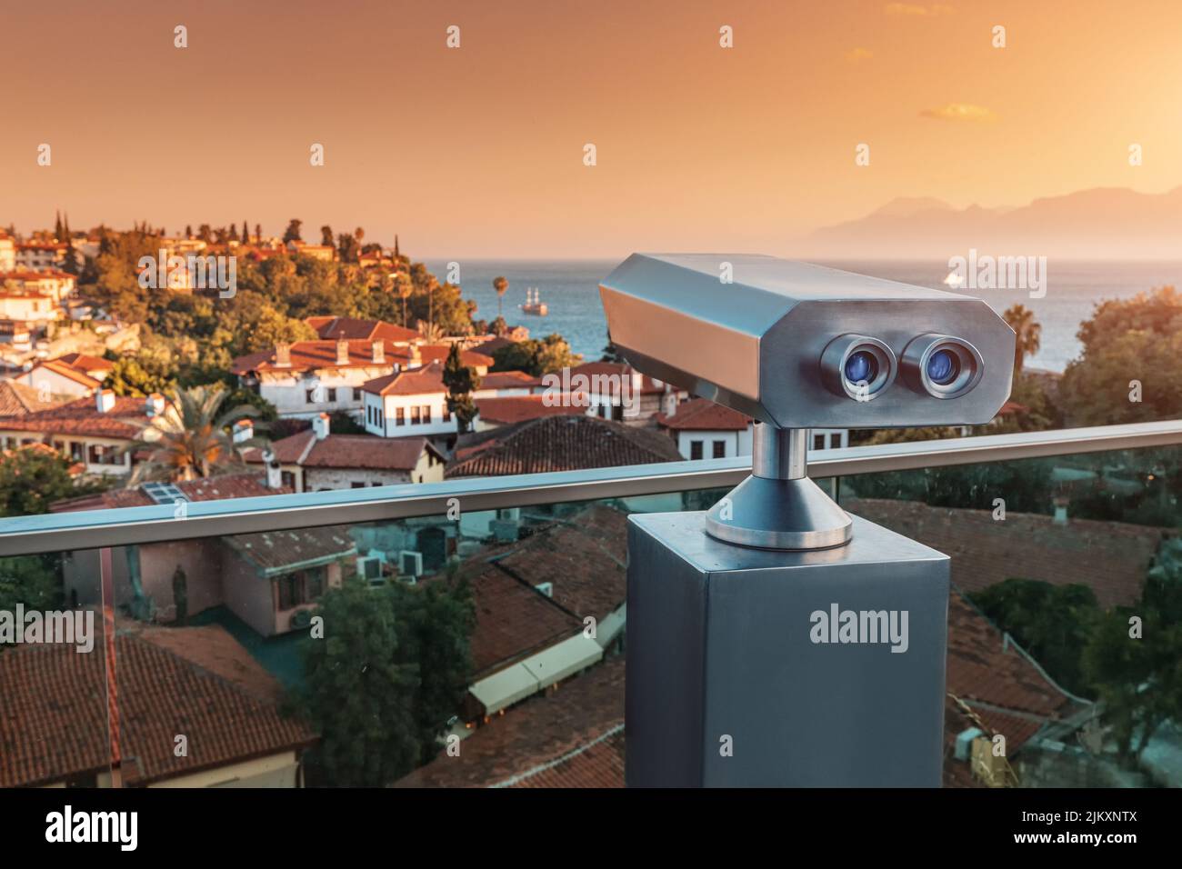 Tourist optical telescope on the observation deck viewpoint overlooking ...