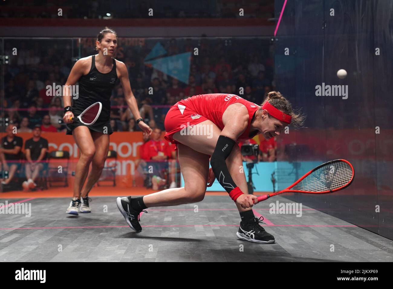 England's Sarah-Jane Perry plays a shot against New Zealand's Joelle ...