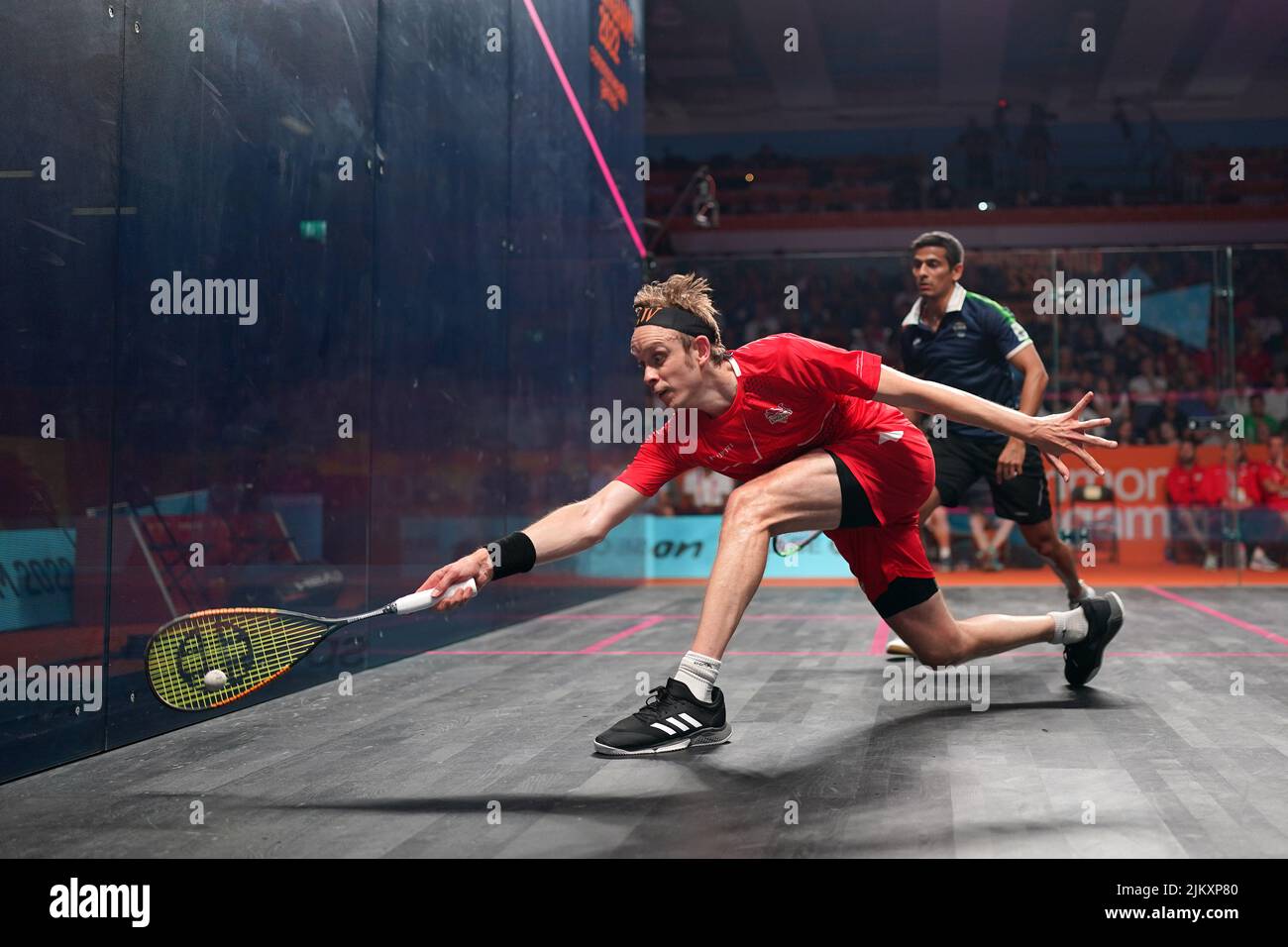 England's James Willstrop plays a shot against India's Saurav Ghosal ...