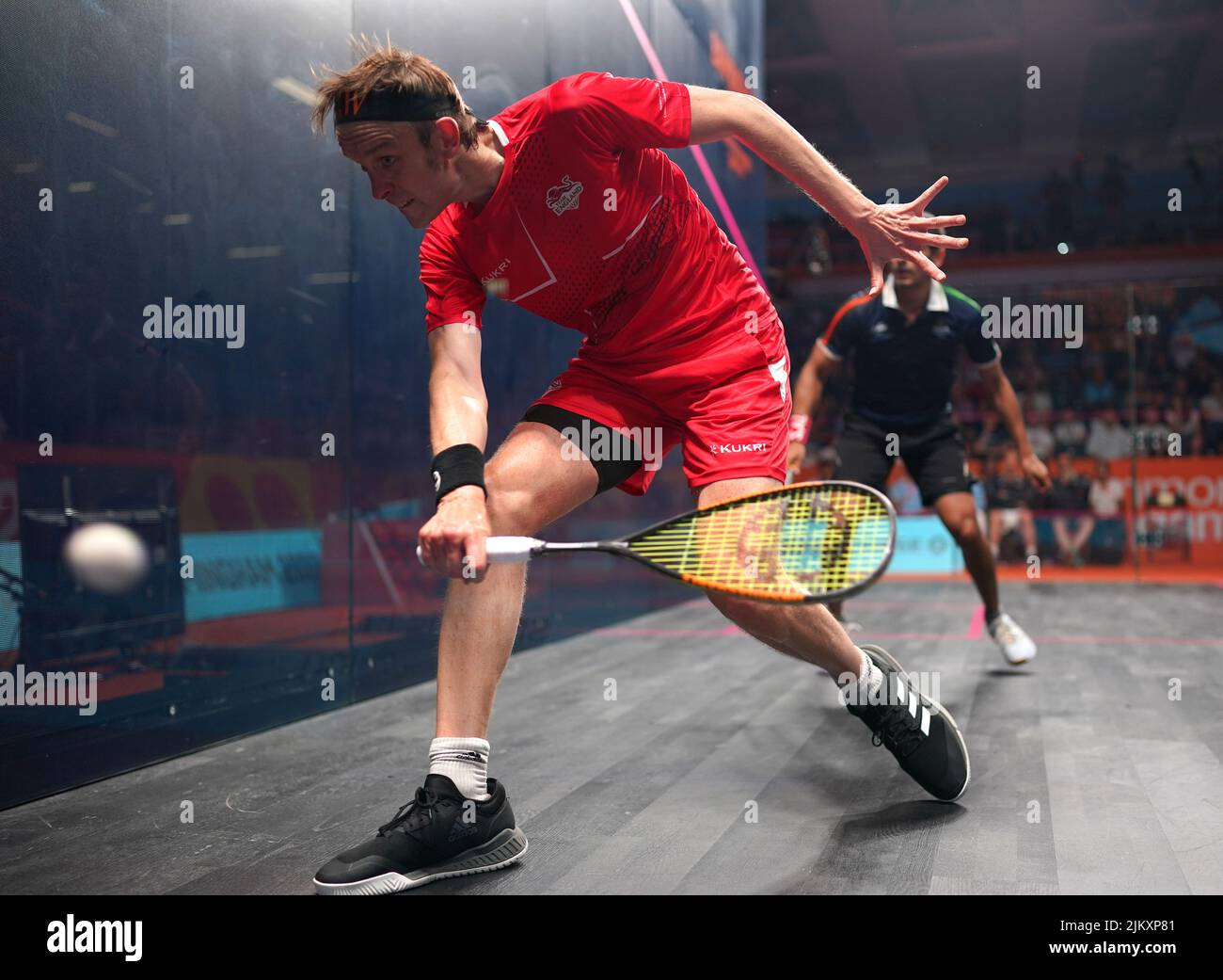 England's James Willstrop plays a shot against India's Saurav Ghosal ...