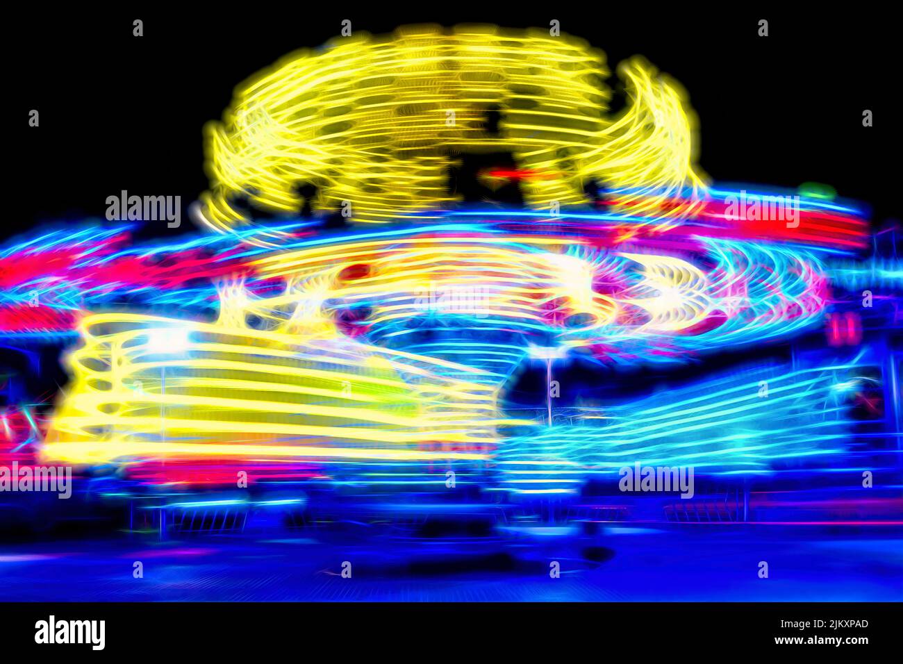 A beautiful view of the abstract multicolor funfair spinning Stock ...