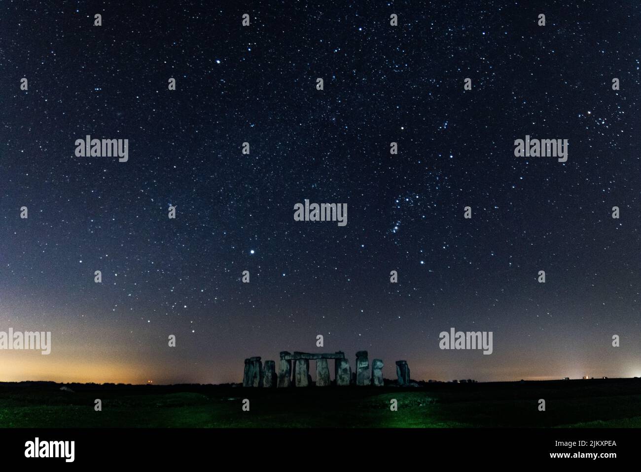 A view of the Stonehenge and the beautiful Orion in the background in ...