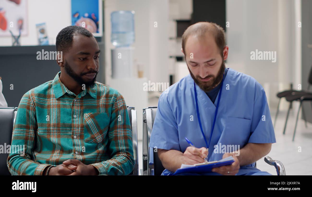 Diverse people talking about disease and healthcare treatment, sitting ...