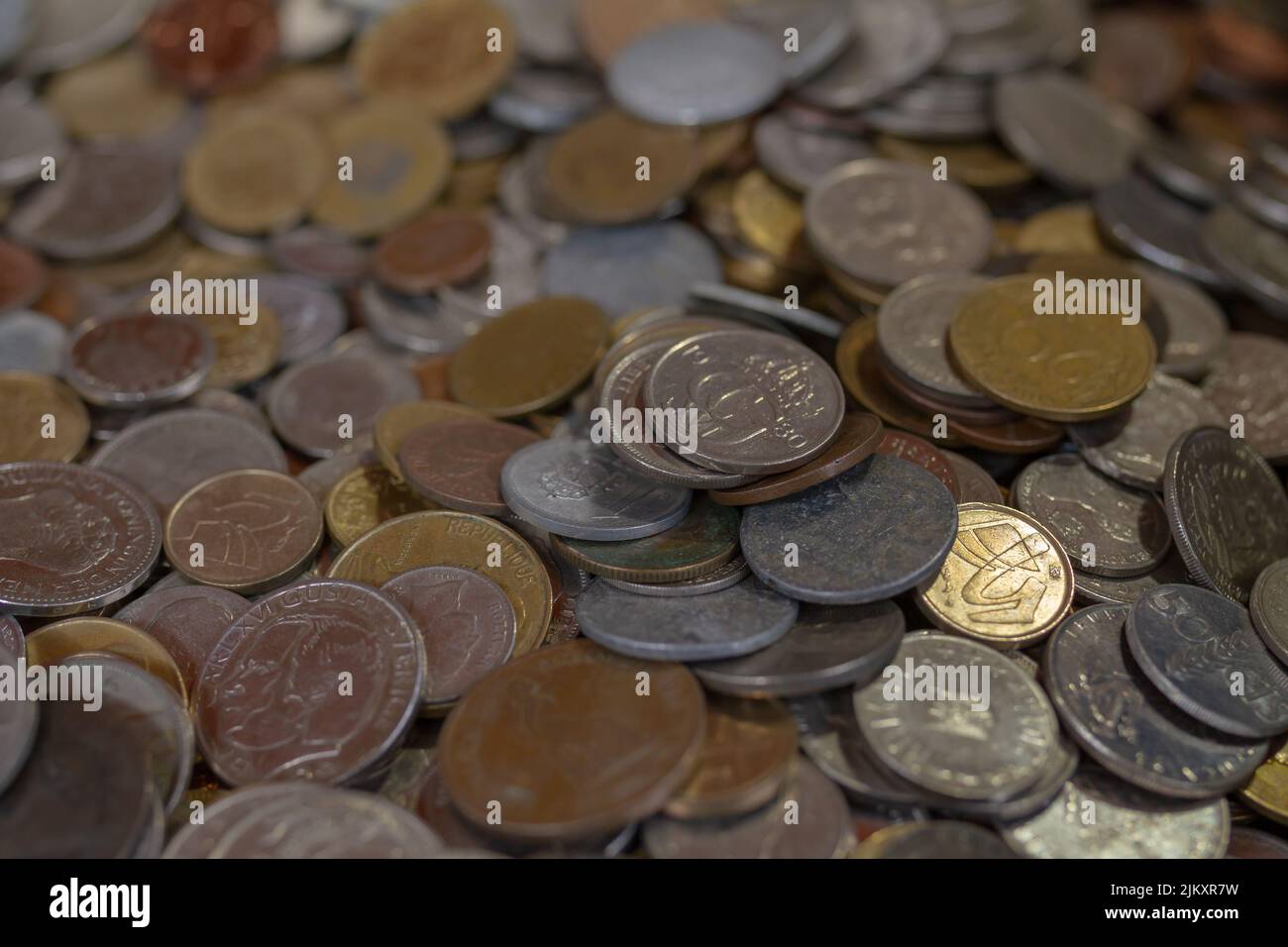 Different types of coins in a flea market in Madrid (El Rastro), Spain ...