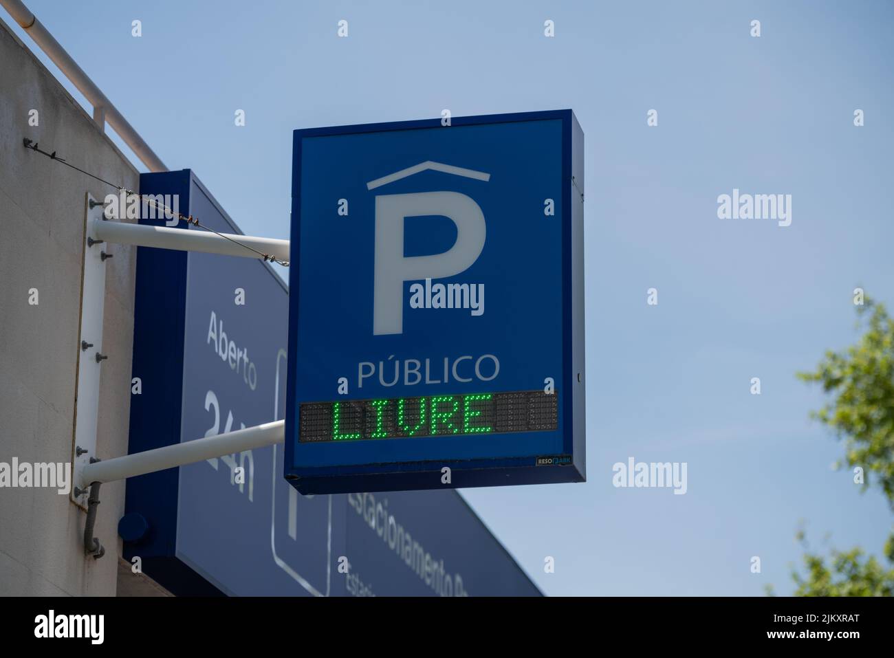 An Illuminated parking sign outside the parking garage structure Stock ...
