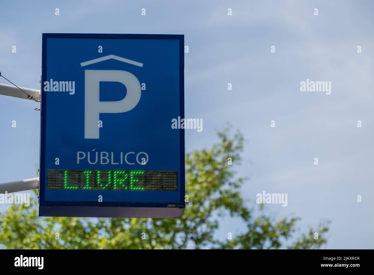 An Illuminated parking sign outside the parking garage structure Stock ...