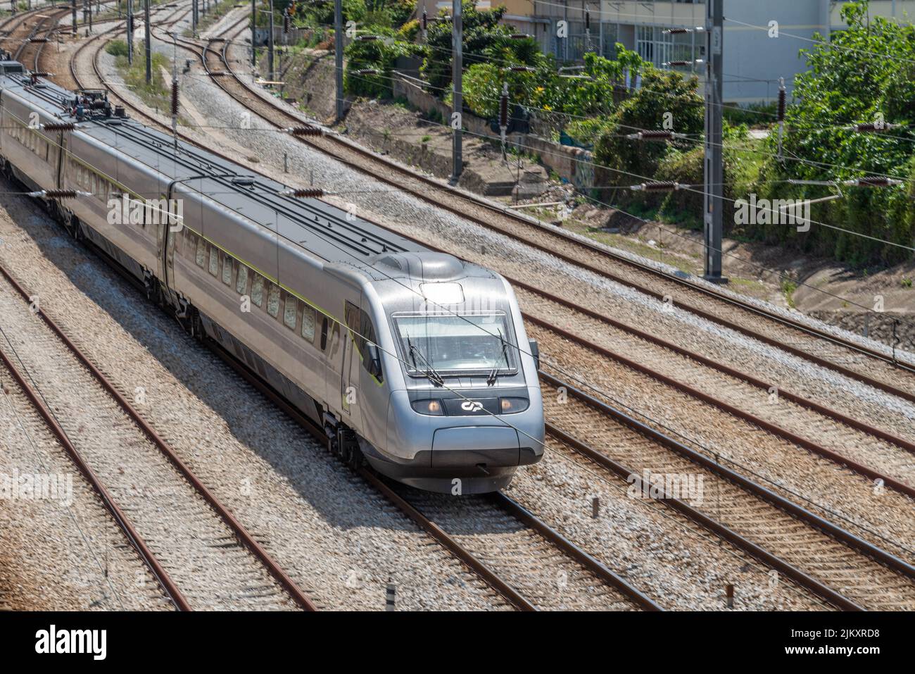 The CP train trains from Portugal leaving Gare do Oriente Station in ...
