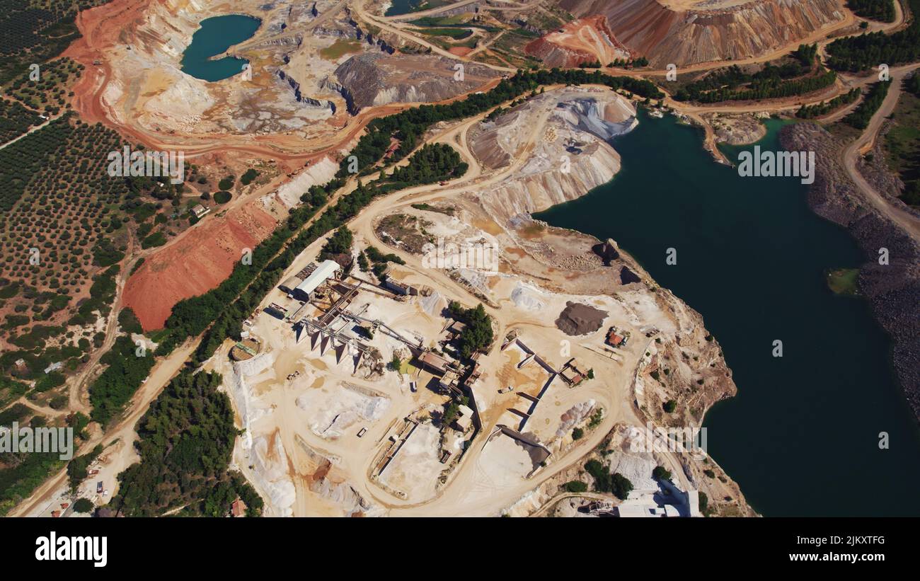 Drone view of open pit mine in Greece. Development and its cost ...
