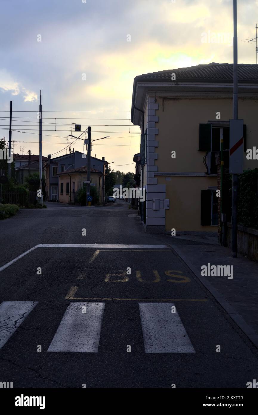 Empty railroad crossing at sunset Stock Photo - Alamy