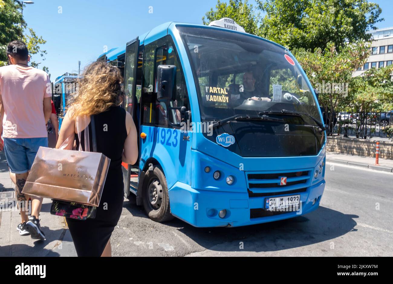 Passengers boarding city mini-bus in Kadikoy, Istanbul, Turkey Stock ...