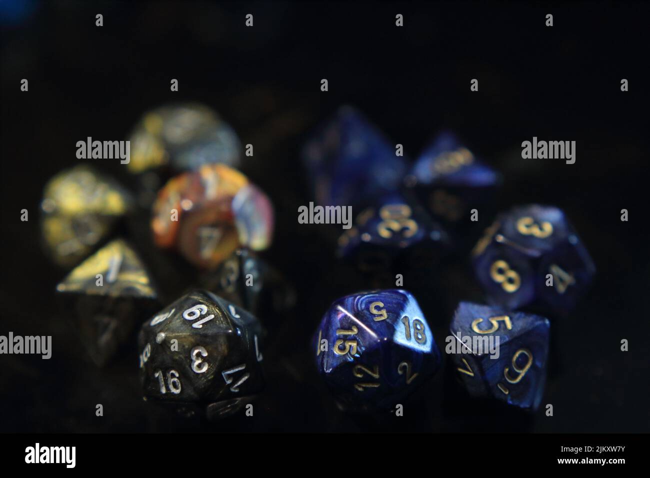 Blue metallic swirl dice with gold numbers and smoke dice with gold ...