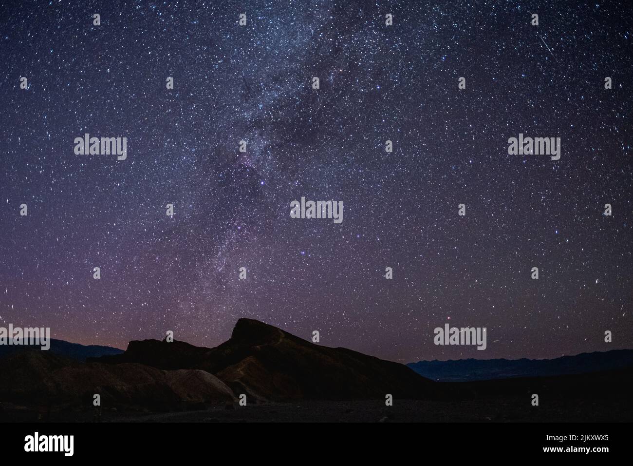 A scenic view of Milky Way galaxy in the night sky Stock Photo - Alamy