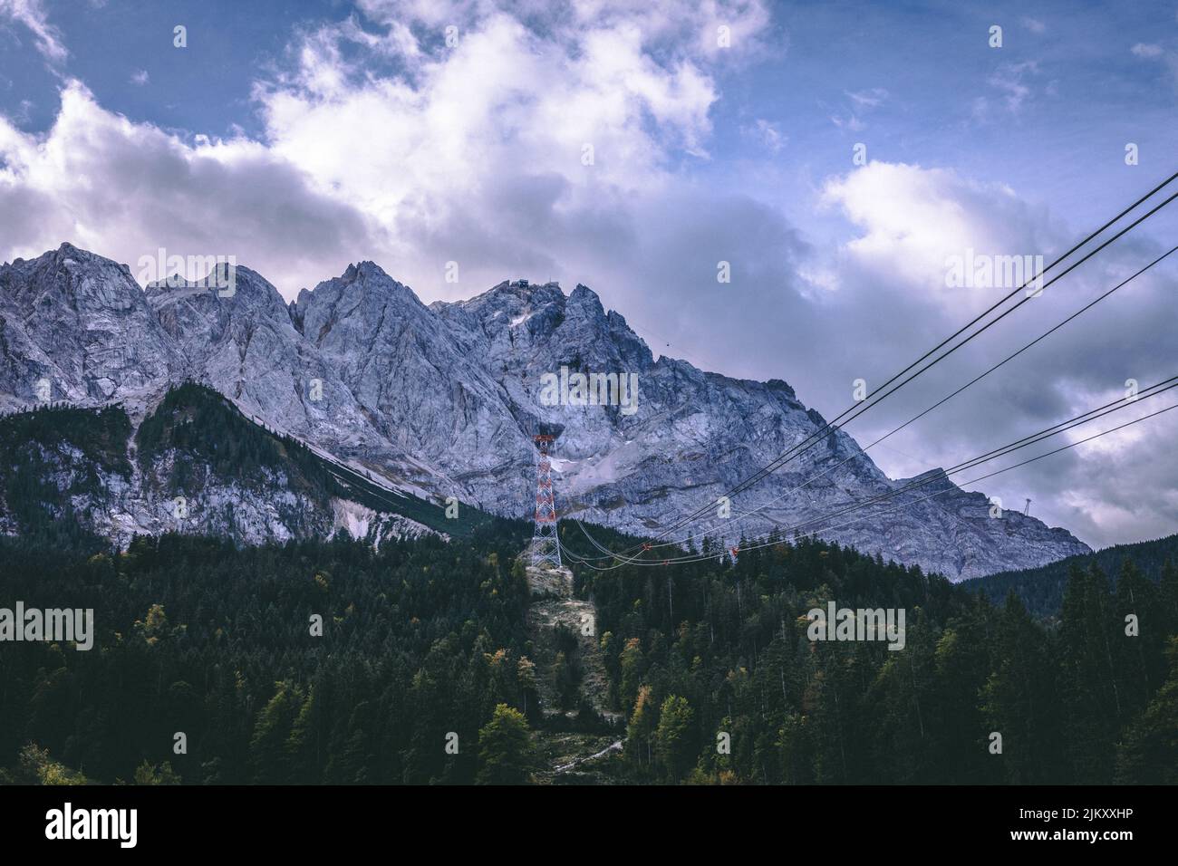 A beautiful view of cable car leading to mountain Zugspitze in Germany ...