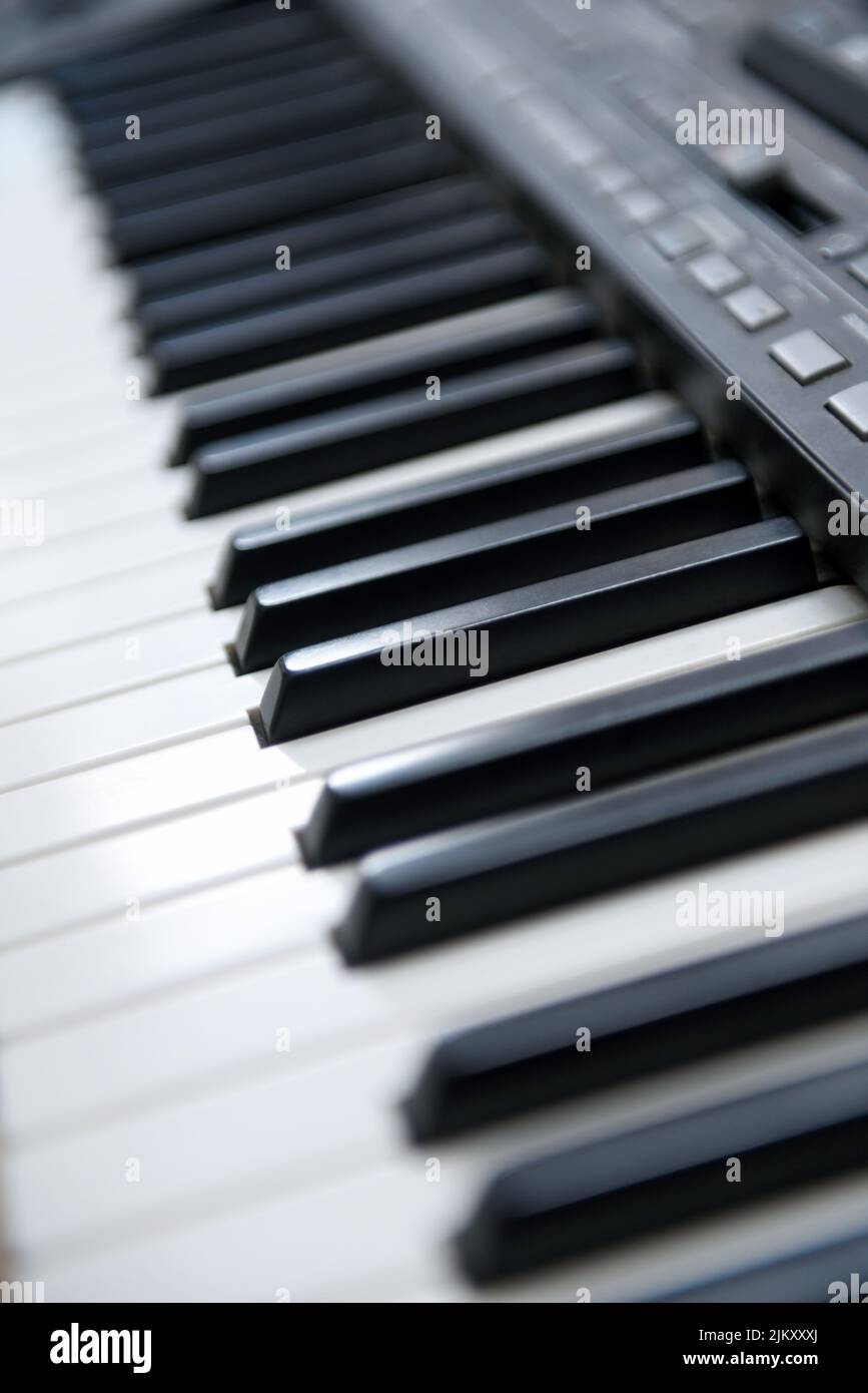 A vertical shot of black and white synthesizer keys Stock Photo - Alamy