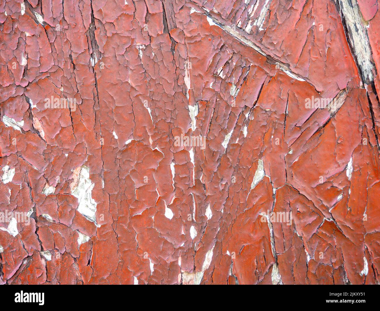 Chipboard in red paint. Background from a painted board. Pattern ...