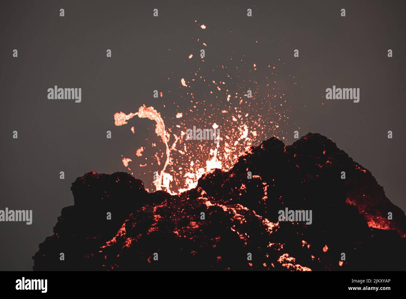 A close-up of the famous Icelandic volcano with lava inside the crater ...