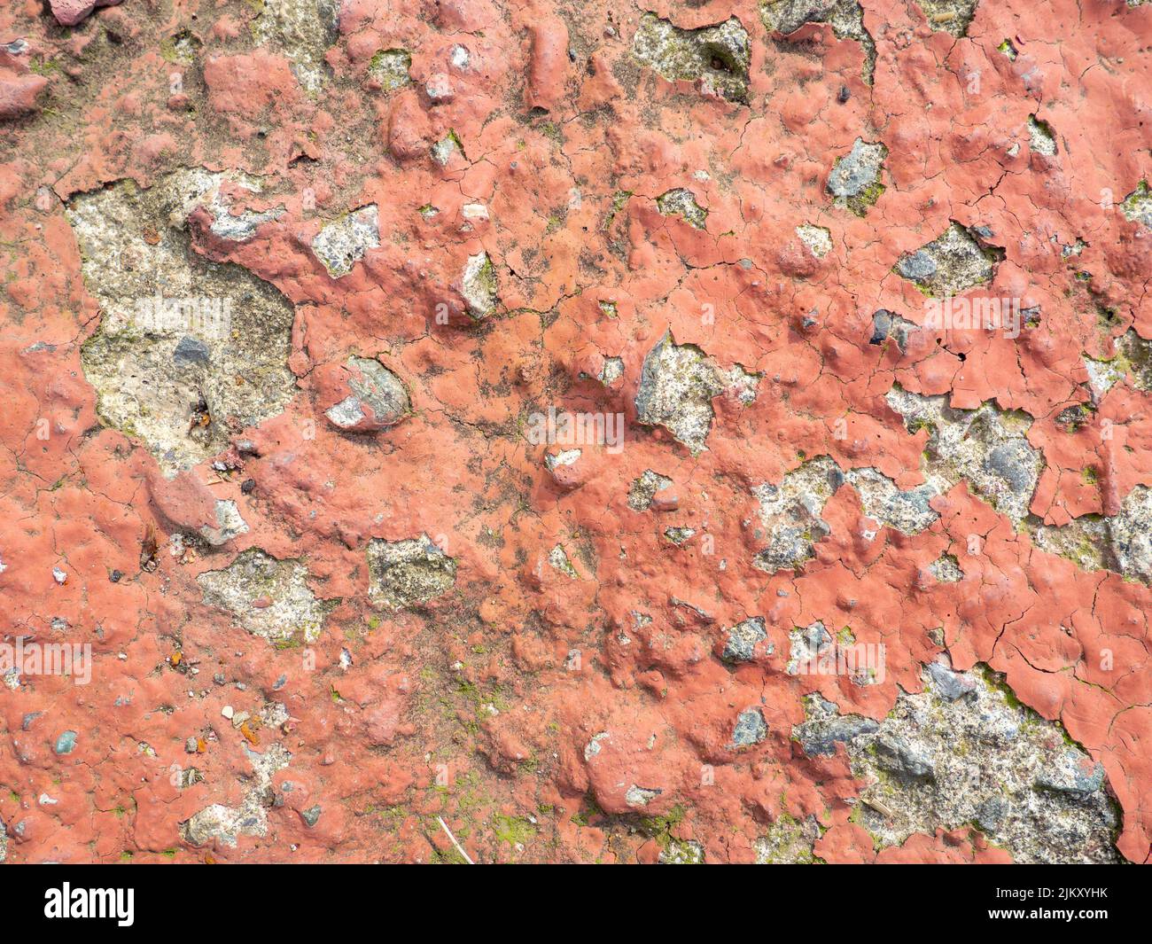 Old uneven surface. The paint is falling off. Stone wall. abandoned ...