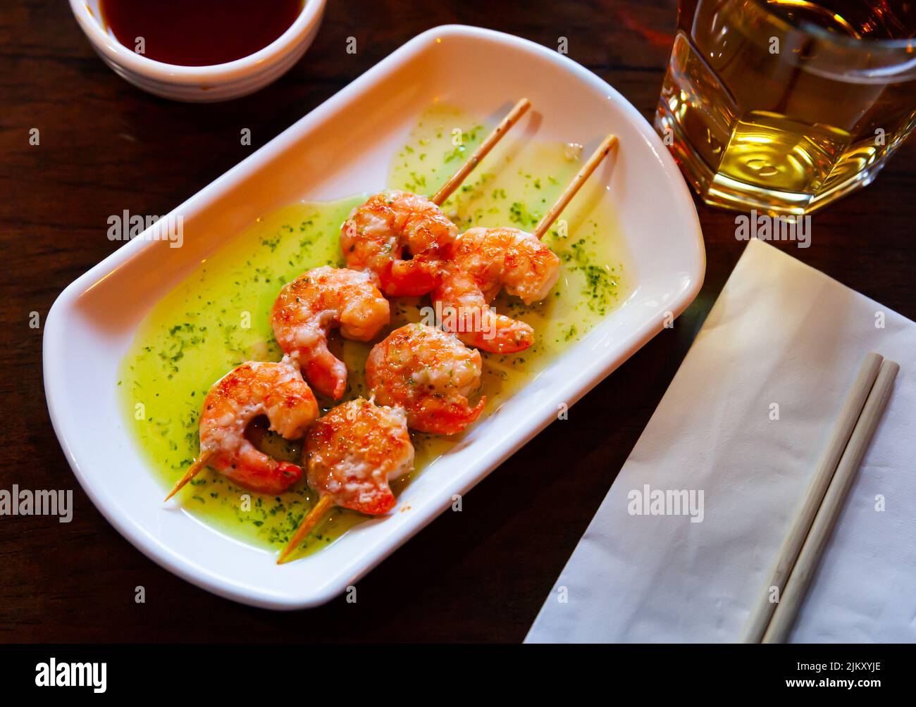 Prawns skewers with herbs. Japanese food Stock Photo - Alamy