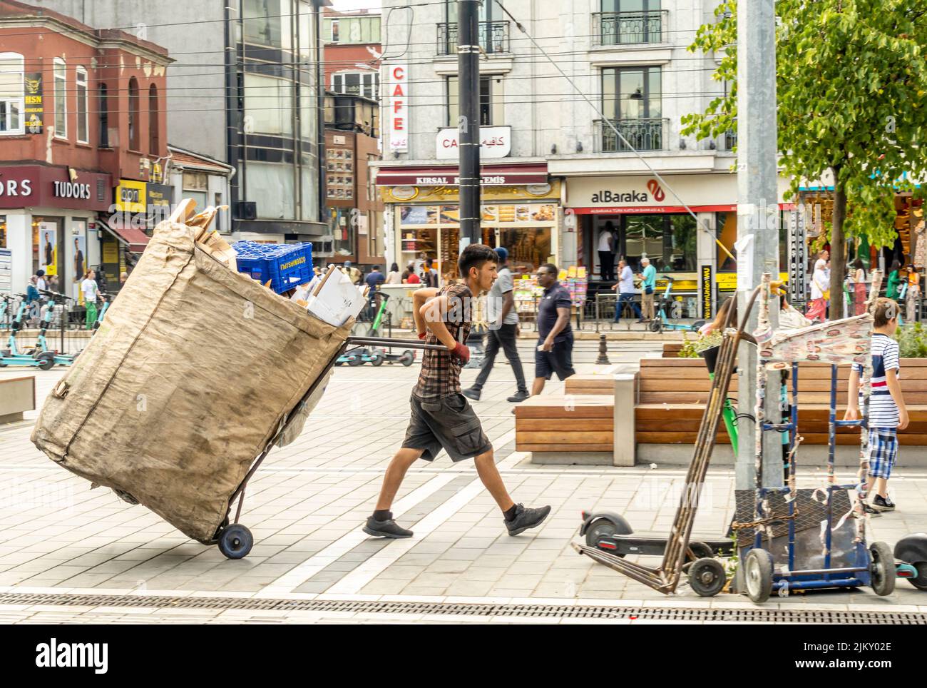 Hand pulled rubbish cart hi-res stock photography and images - Alamy