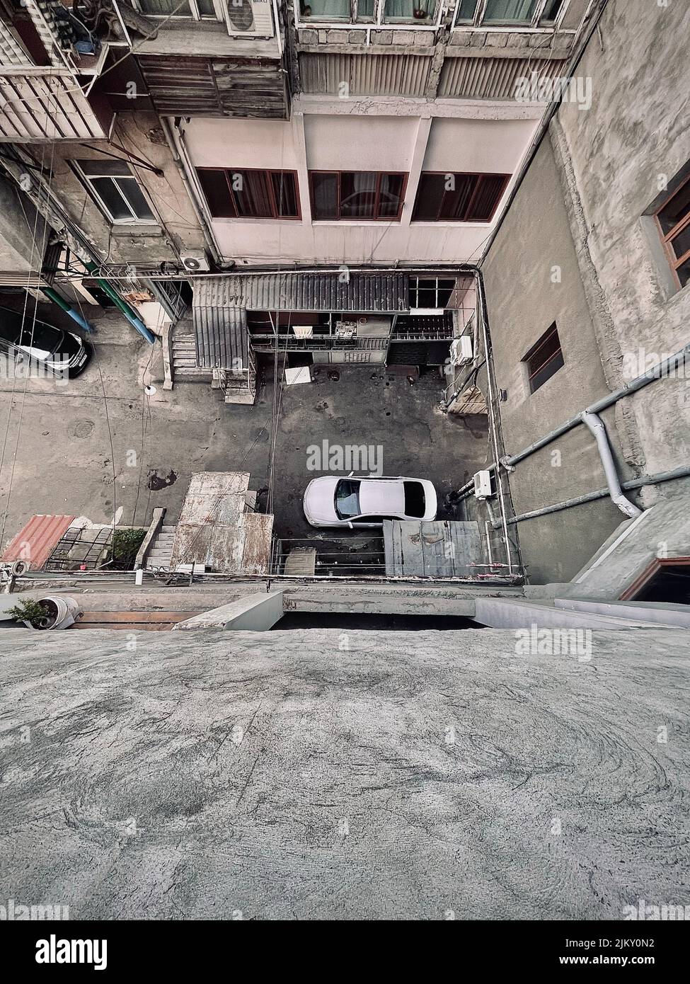 A vertical shot from a window of an inner yard in Yerevan, Armenia ...