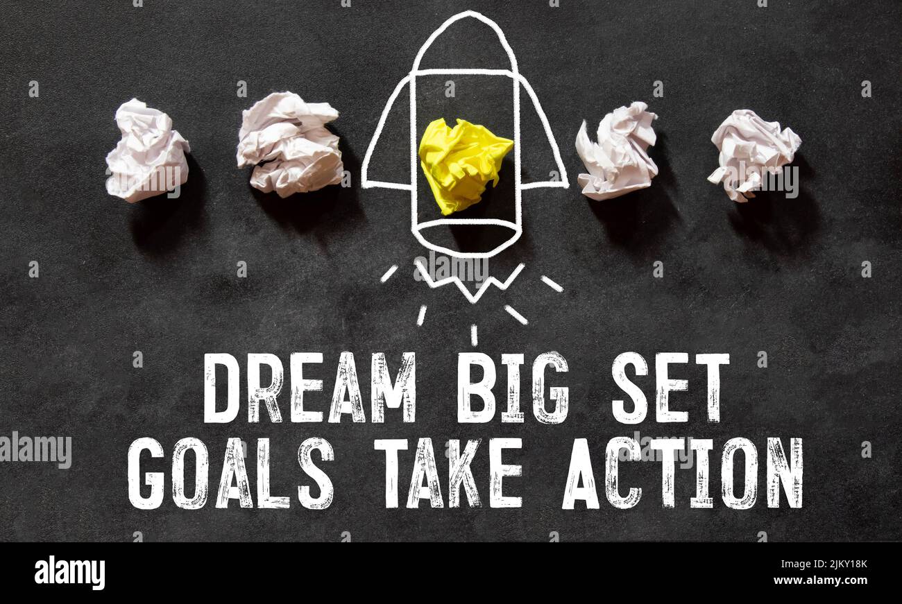 Dream Big Set Goals Take Action text quote on notepad, concept background Stock Photo - Alamy
