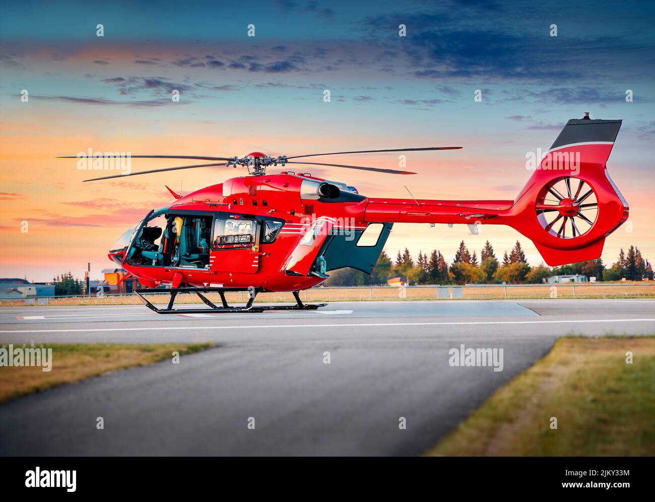 Red color helicopter in the air. Great photo on the theme of air ...