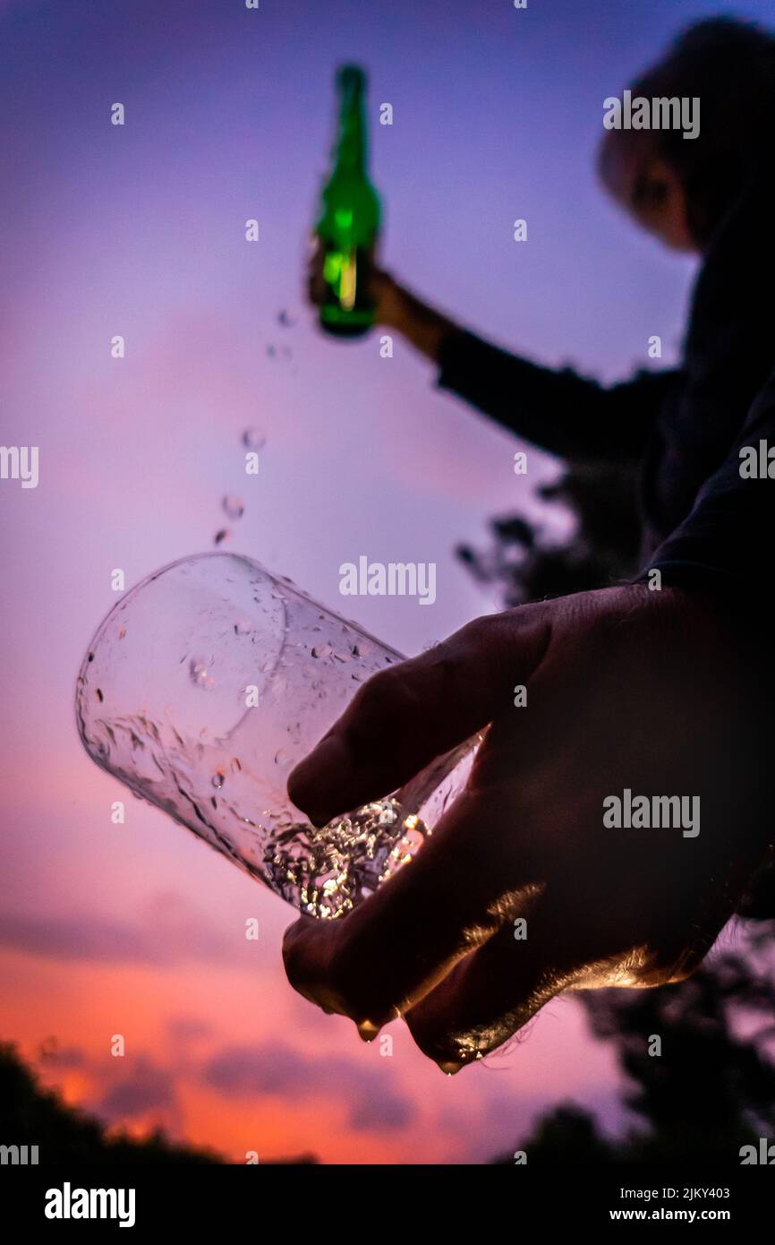 Bartender pouring beer mug in hi-res stock photography and images - Alamy