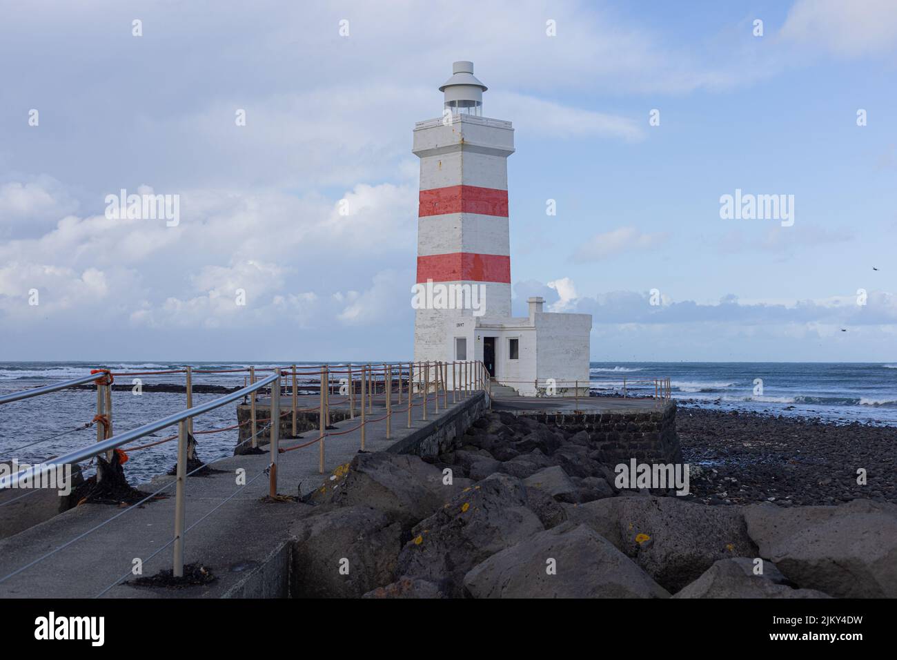 The famous Gardur lighthouse on the coast of Iceland Stock Photo - Alamy