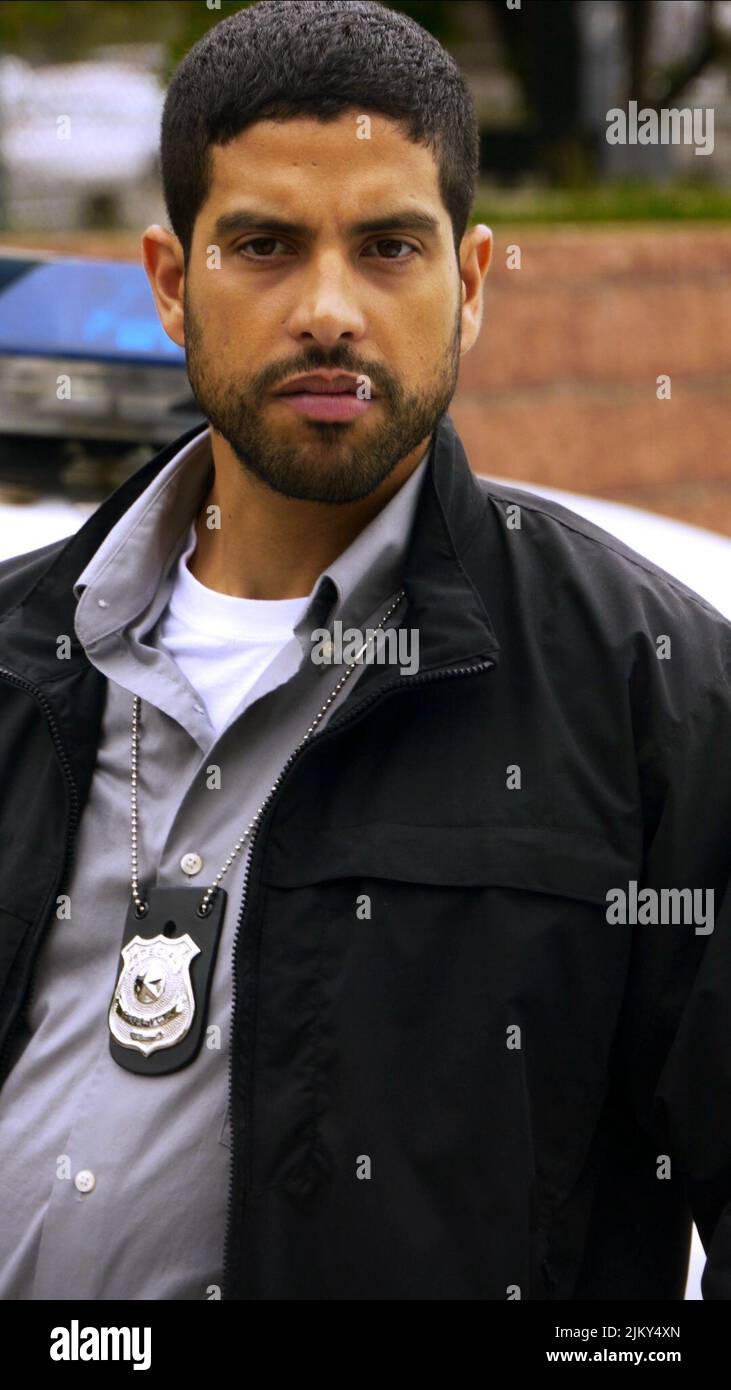 ADAM RODRIGUEZ, CAUGHT IN THE CROSSFIRE, 2010 Stock Photo - Alamy