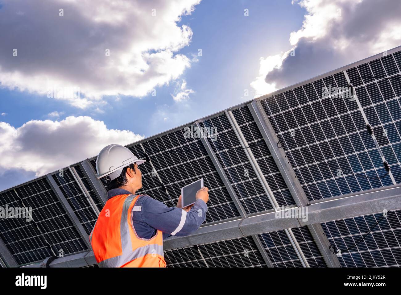 Technicians are checking the operation of the solar power plant ...