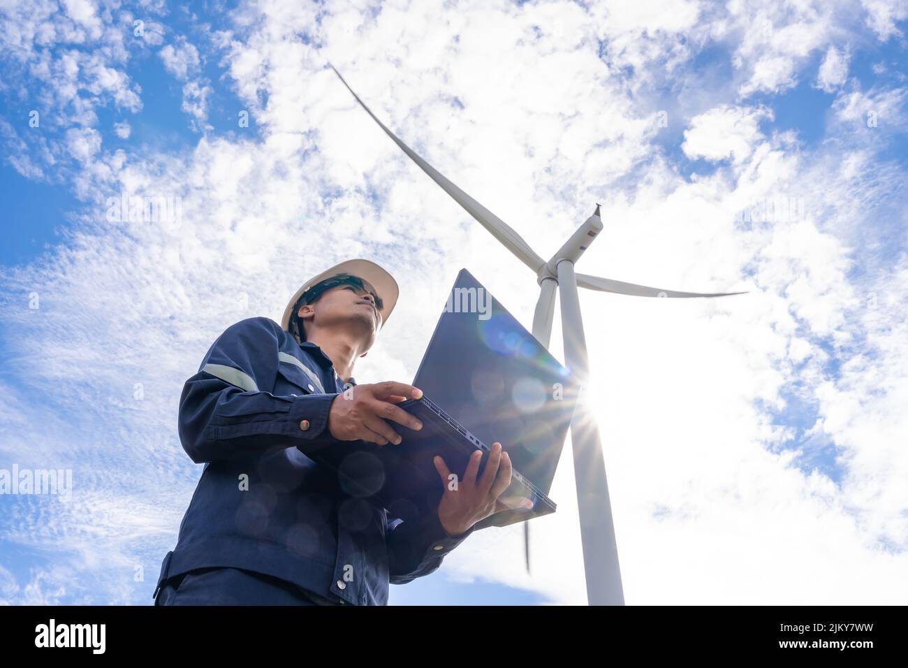 Engineer walk to check wind power plants with check performance. Wind ...
