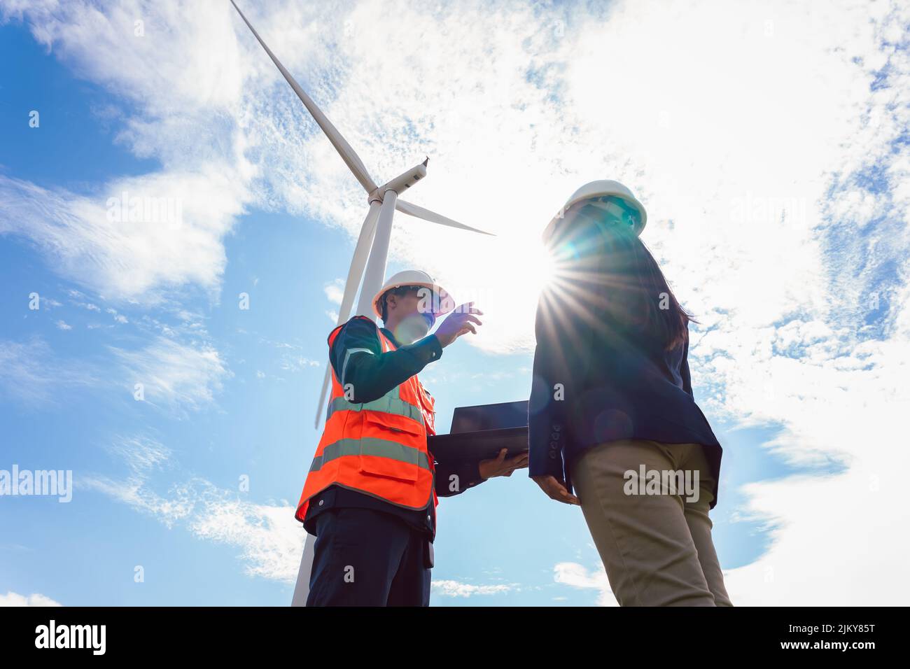 Engineers take investors on a tour of wind power plants. Wind turbines ...