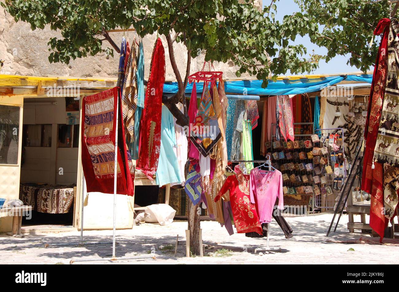Colored stall selling dresses Stock Photo - Alamy