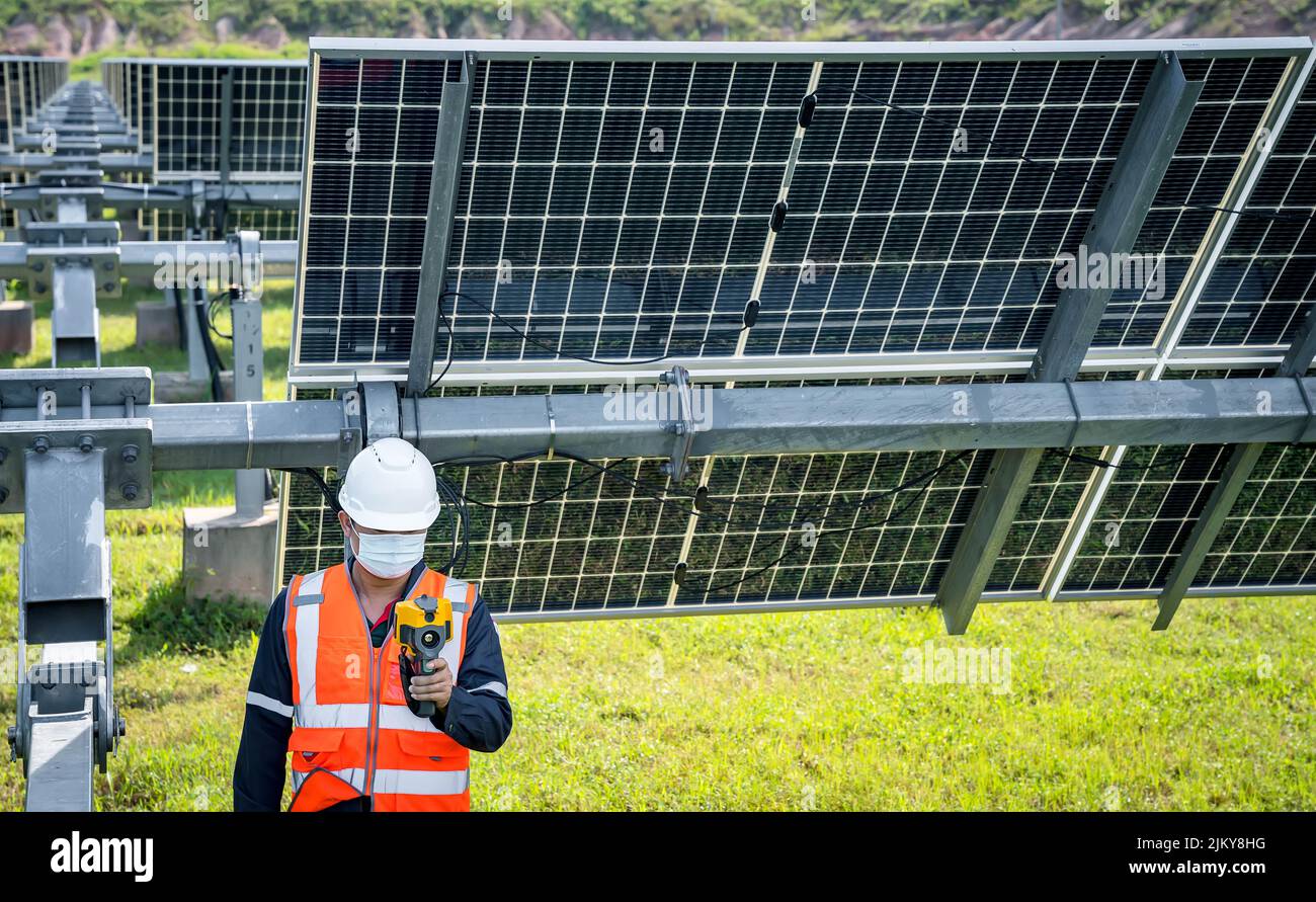 The technician takes the Thermoscan(thermal image camera) scan to the ...