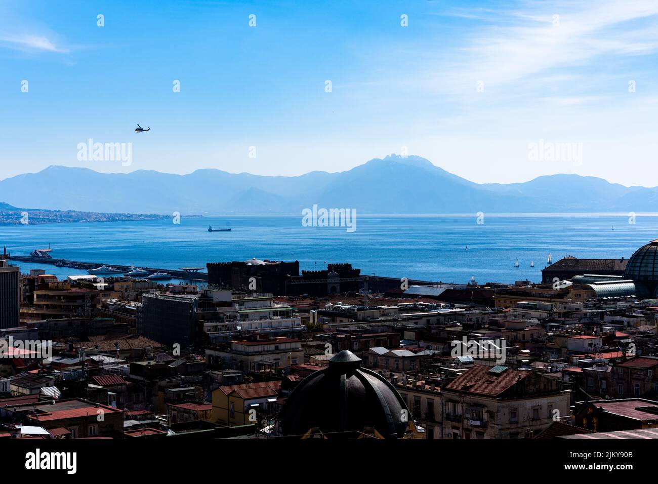 An aerial shot of beautiful buildings near the water in Napoli, Italy ...
