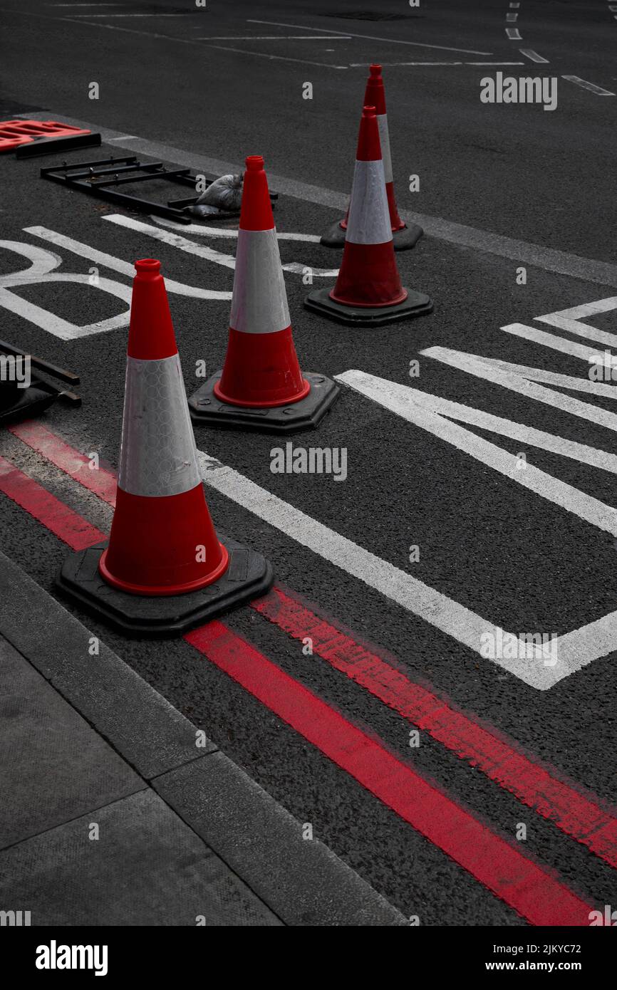 Three red traffic cones hi-res stock photography and images - Alamy
