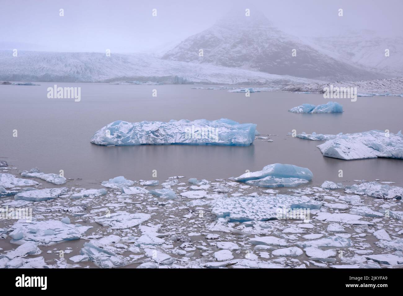 Large iceberg floating in Fjallsarlon glacier lake in Iceland. Large ...