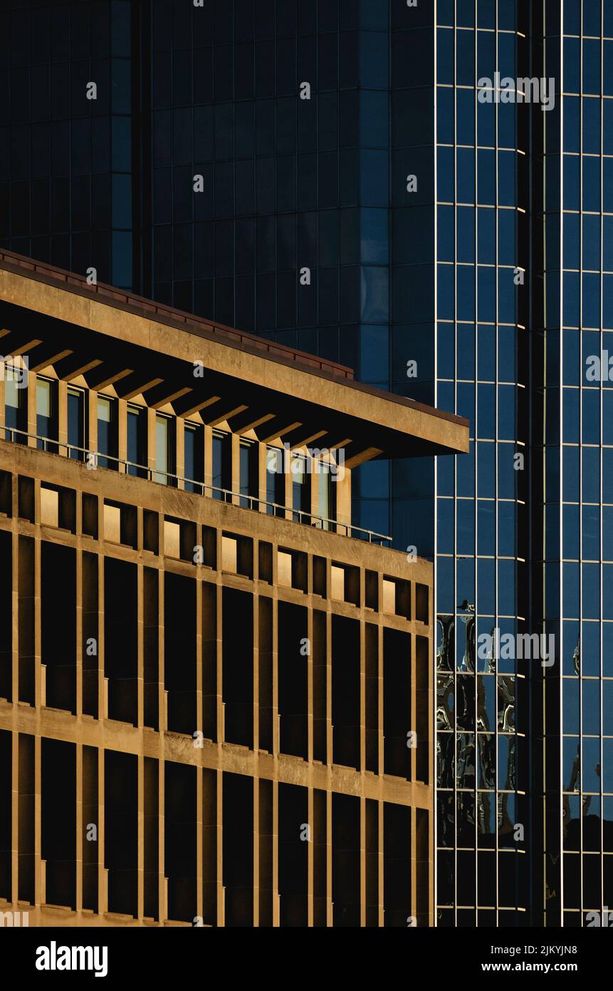 A vertical shot of the exterior design of high modern buildings of a ...