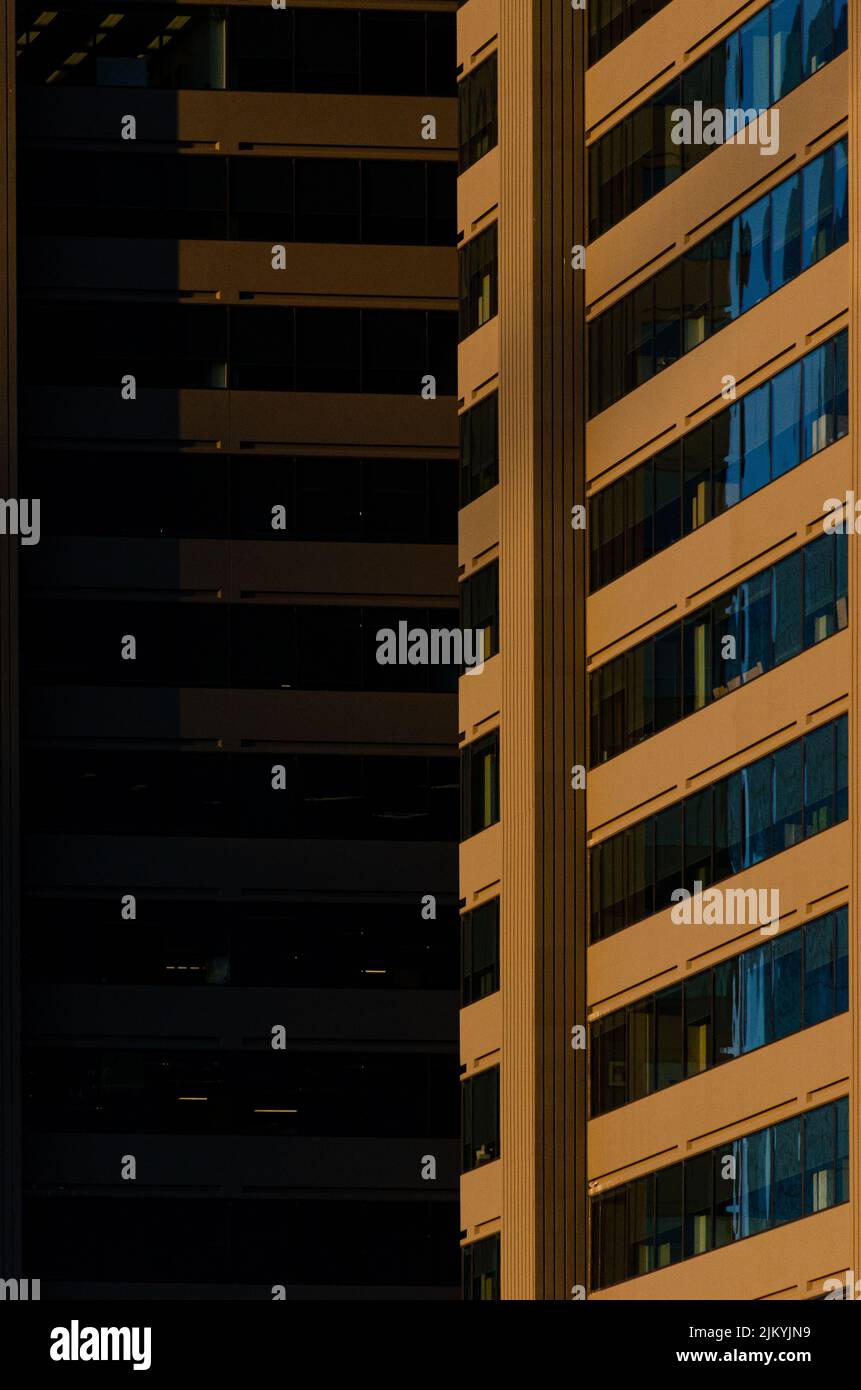 A vertical shot of the exterior design of modern high residential ...