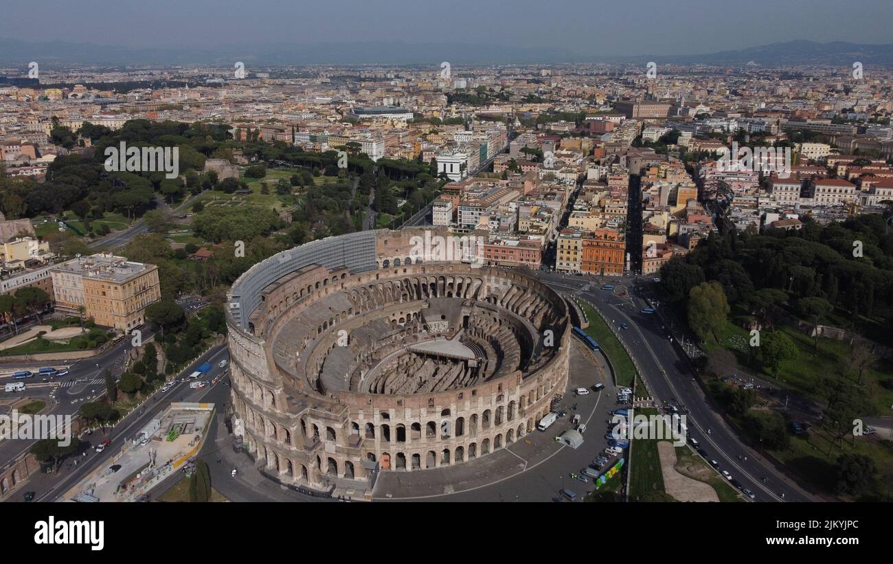 An aerial view of the Colosseum and the cityscape on a beautiful sunny ...