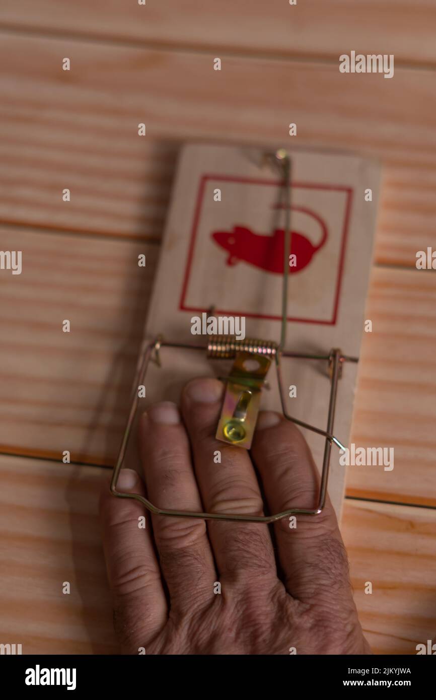 Hand in the trap hi-res stock photography and images - Alamy
