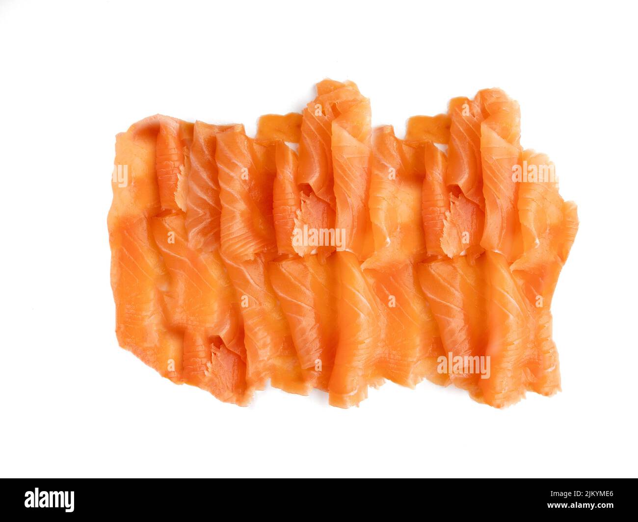 A close-up of finely sliced pieces of Sottish smoked salmon on a white ...