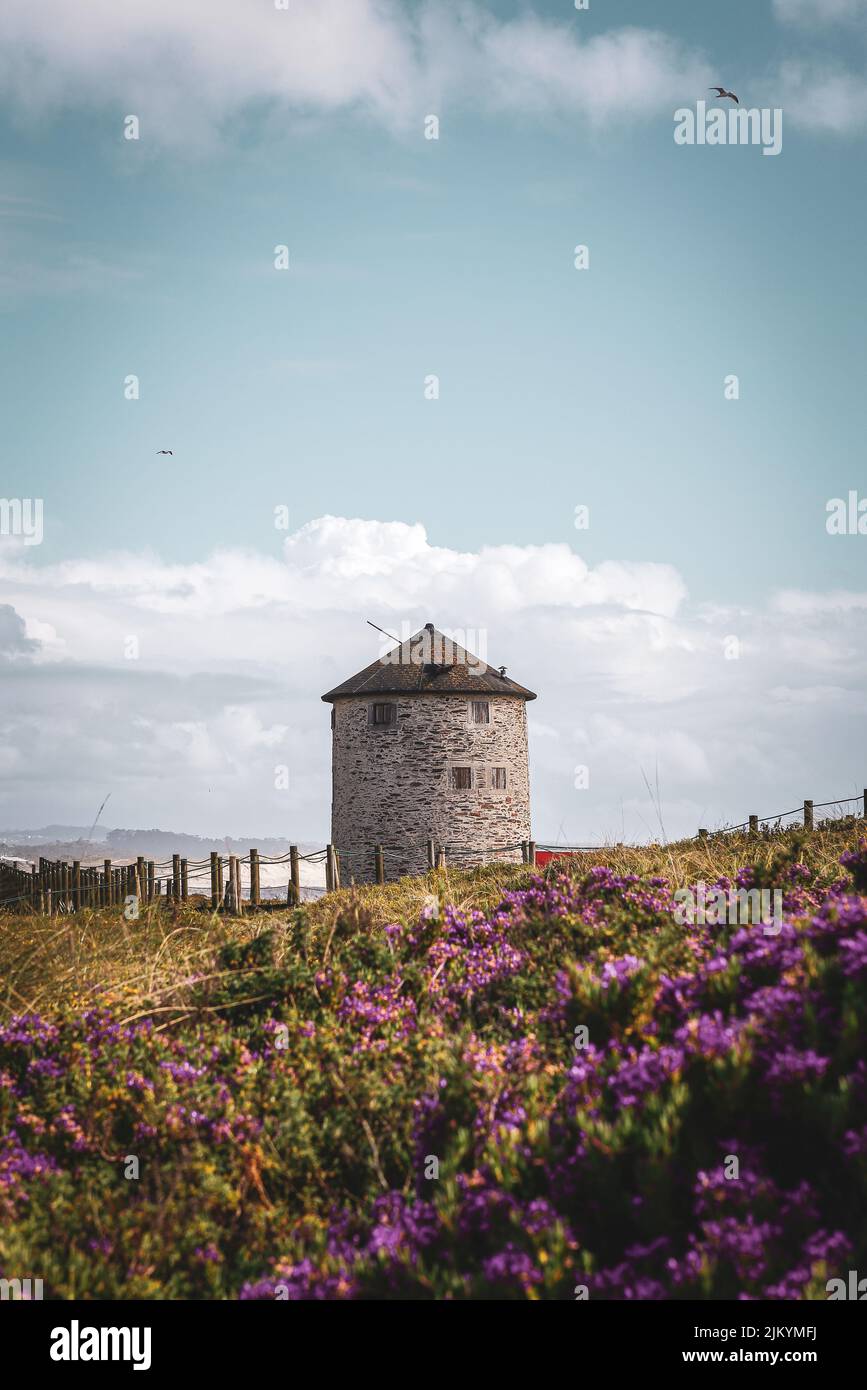 Windmill on green hill hi-res stock photography and images - Alamy