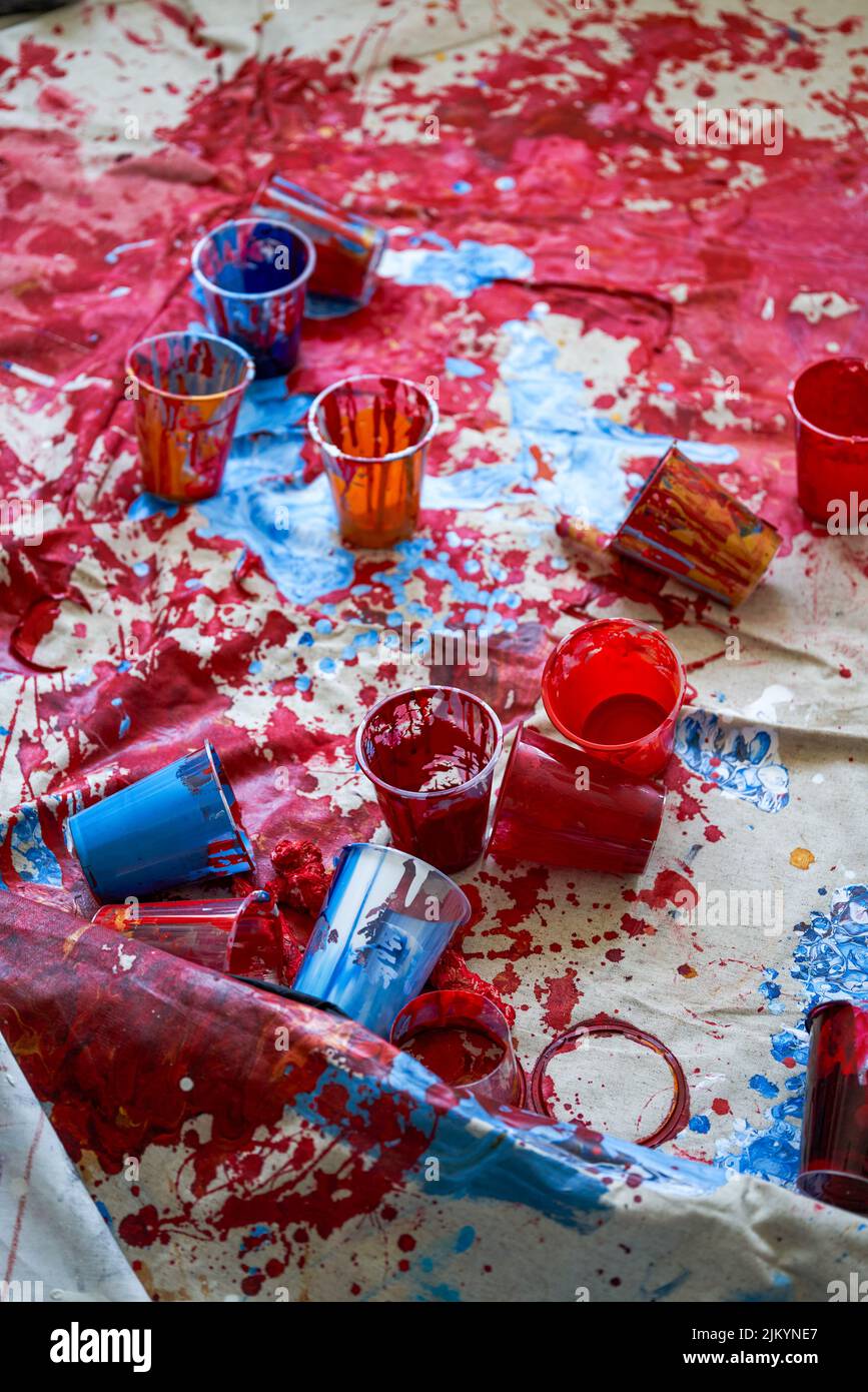 Watercolor painter's workbench and messy color paints Stock Photo - Alamy