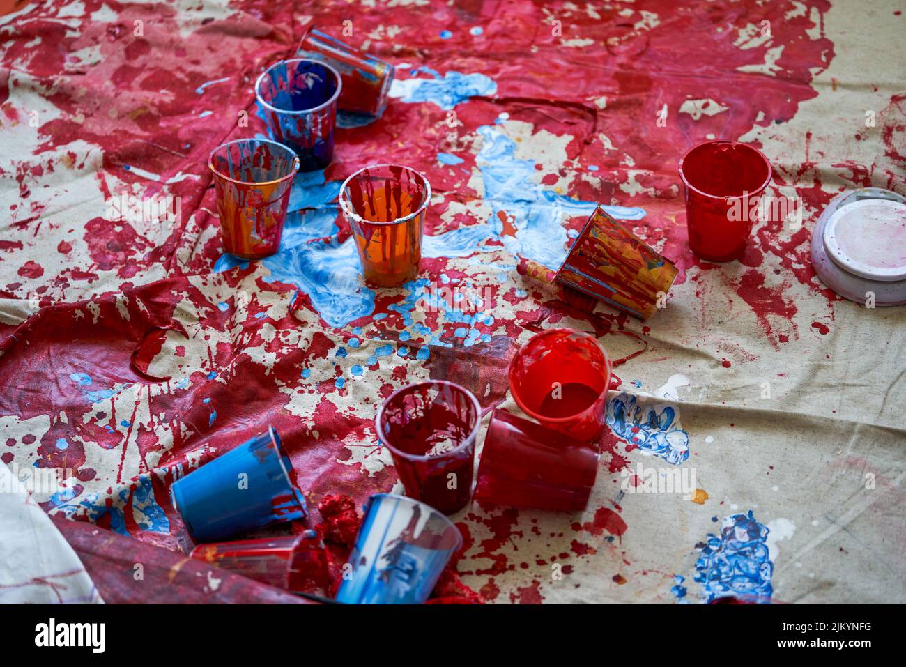 Watercolor painter's workbench and messy color paints Stock Photo - Alamy