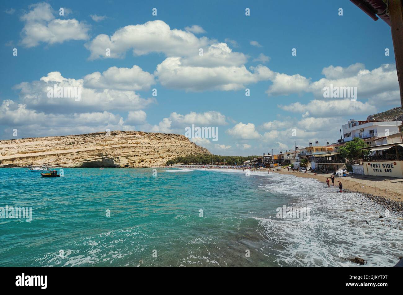 Matala, beautiful beach on Crete island, waves and rocks, Greece Stock ...