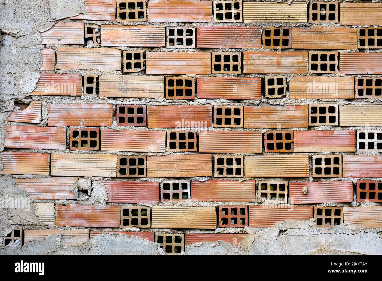 A closeup of an unfinished brick wall construction Stock Photo - Alamy