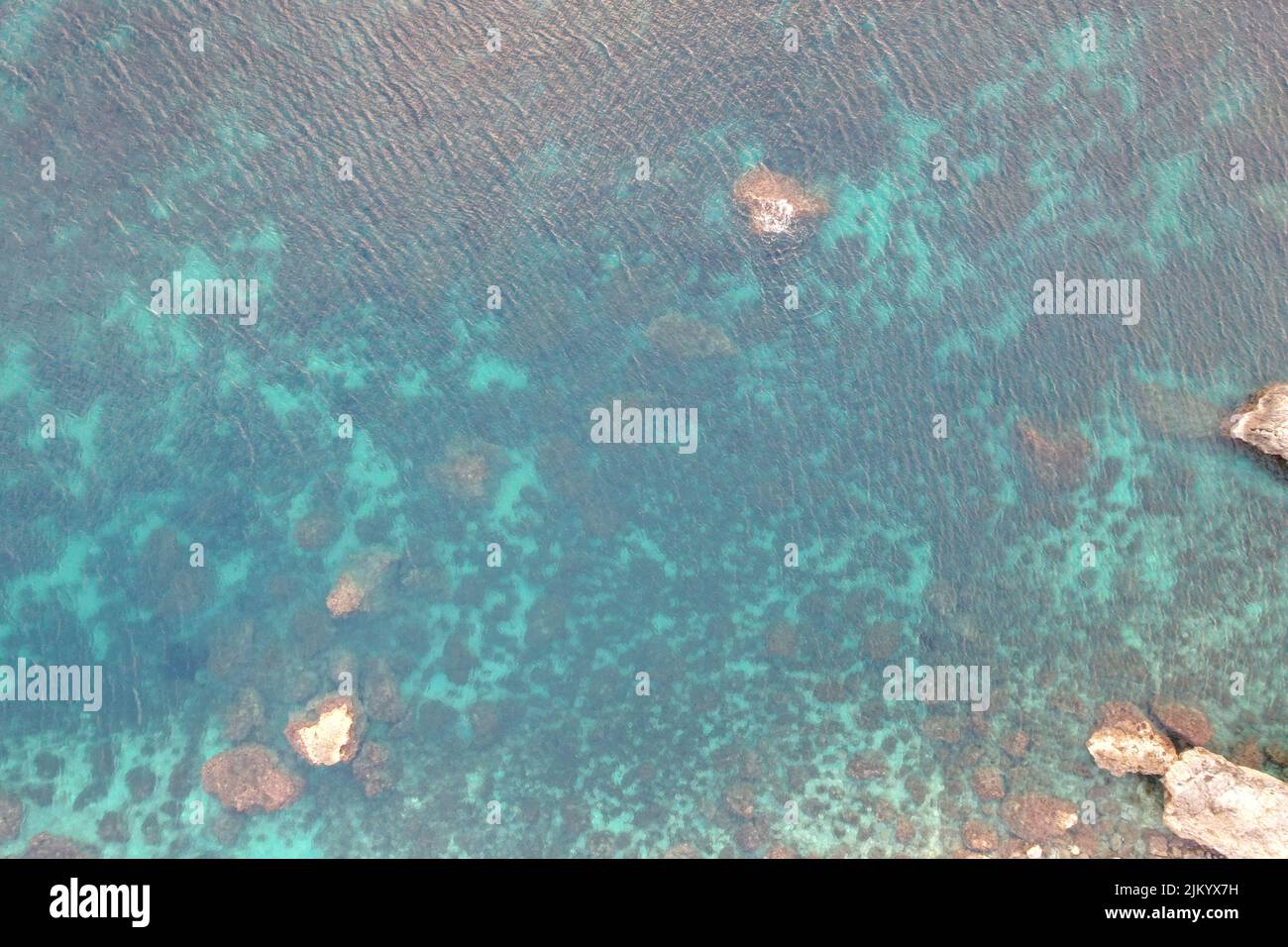 An aerial view of a blue ocean in a daylight Stock Photo - Alamy
