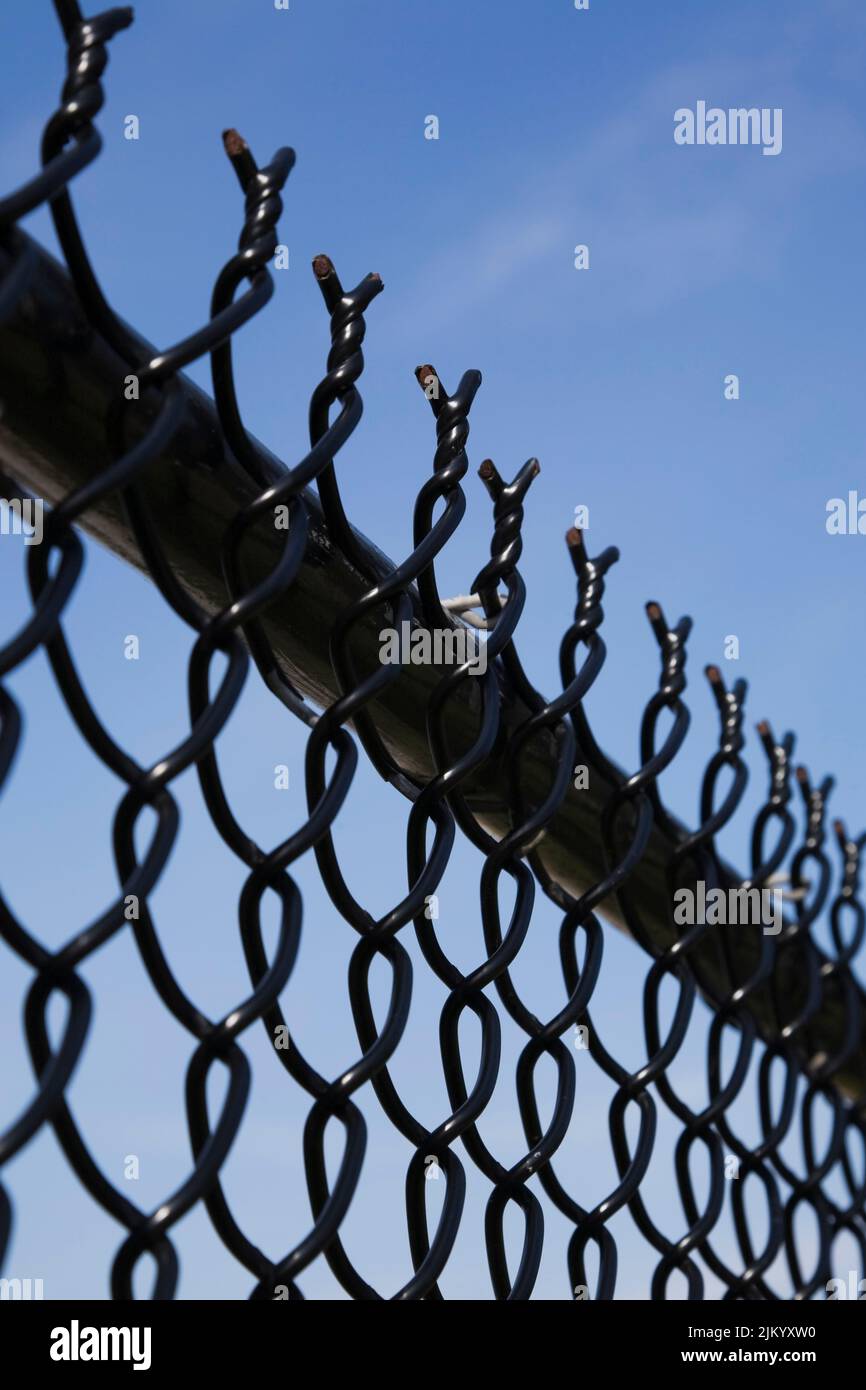 Close-up of wire mesh security fence Stock Photo - Alamy